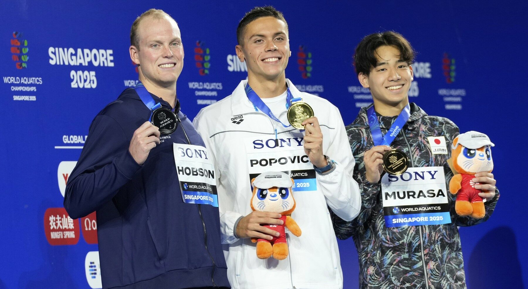 Americanii nu s-au ferit de cuvinte, după ce David Popovici l-a surclasat din nou pe Luke Hobson ...